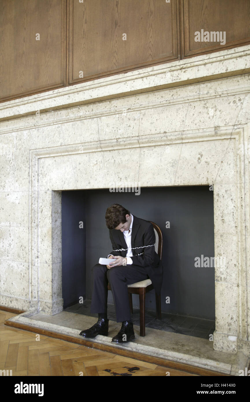 Man tied to chair hi-res stock photography and images - Alamy