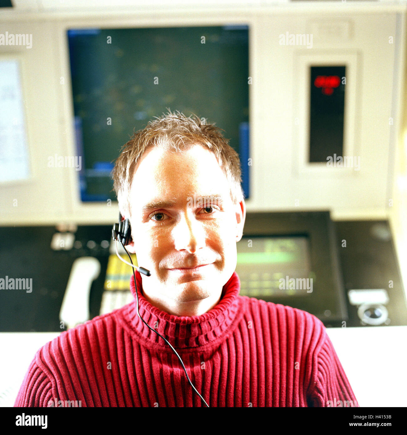 Airport, controlling tower, air traffic controller, headset, smile ...