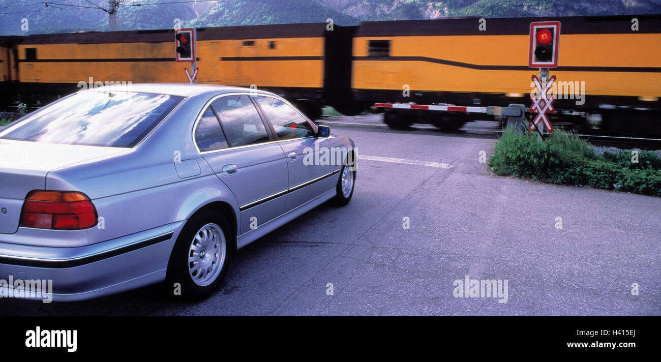 BMW, gates, closed, goods train, passenger car, train, drive past, stop ...