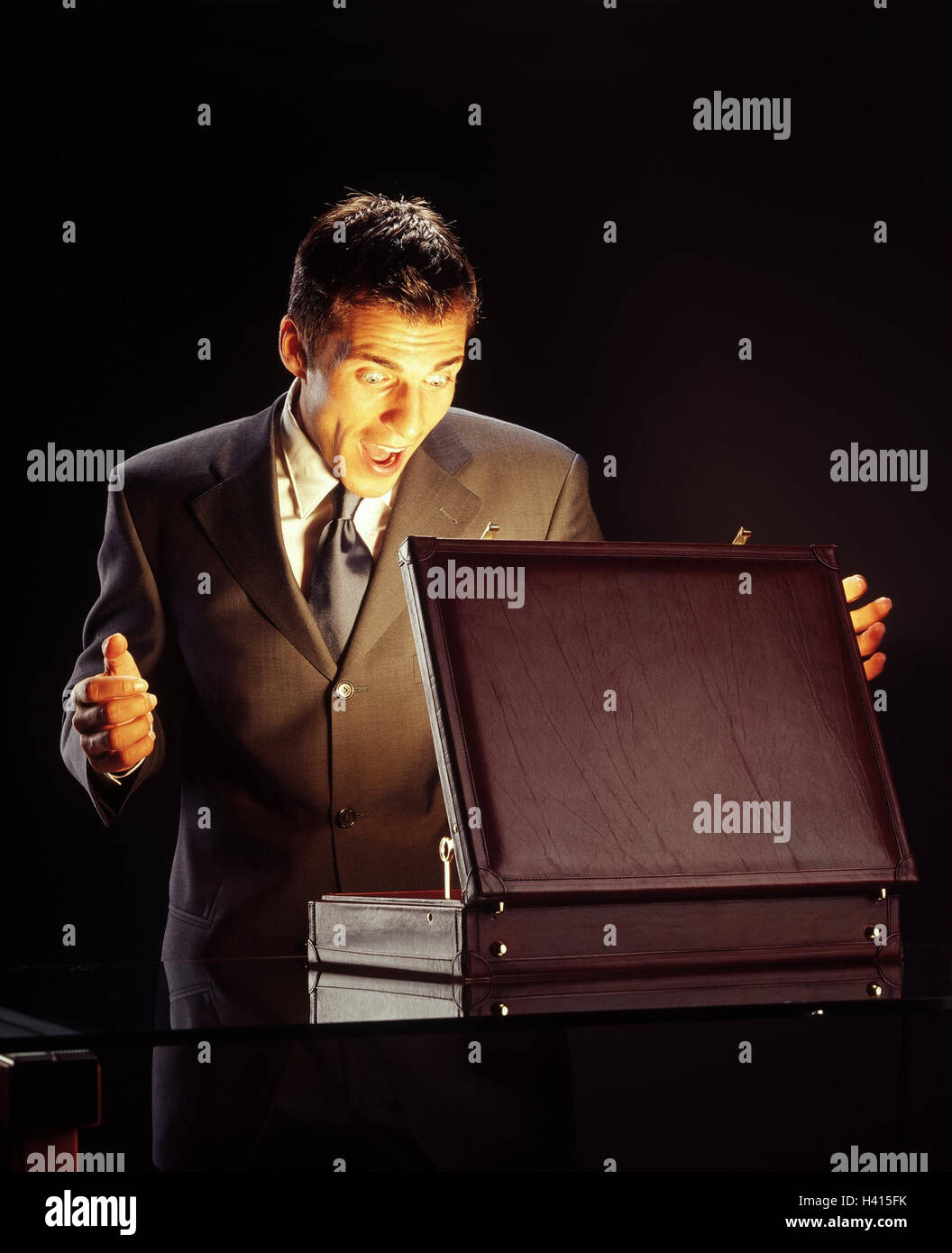 Briefcases, businessman, young, open, facial play, surprise, monetary ...