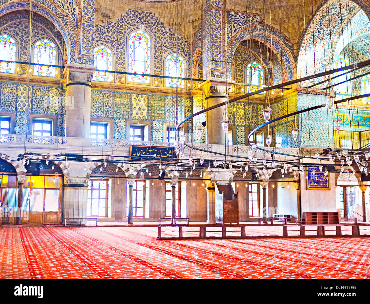 The walls of the Blue Mosque covered with numerous blue tiles with ...