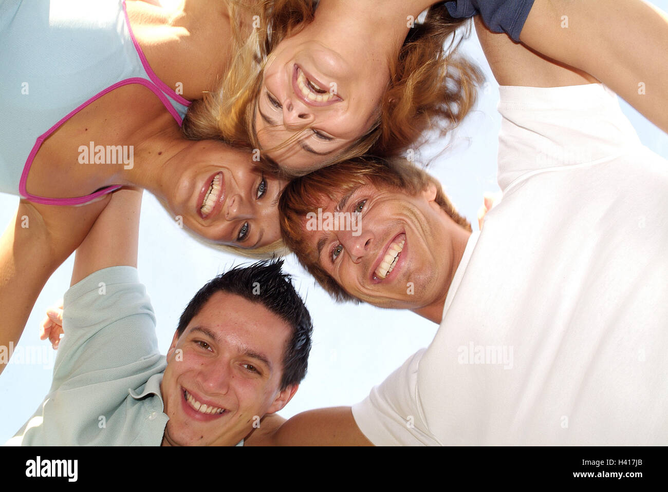 Couples, young, happy, stand, embrace circle, from below, portrait ...