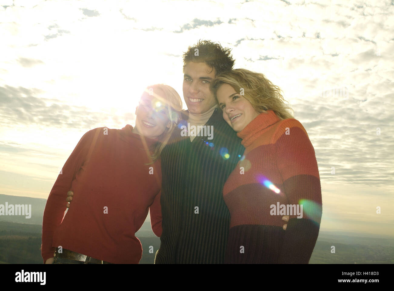 Women, man, young, happy, embrace, group picture, half portrait, back ...