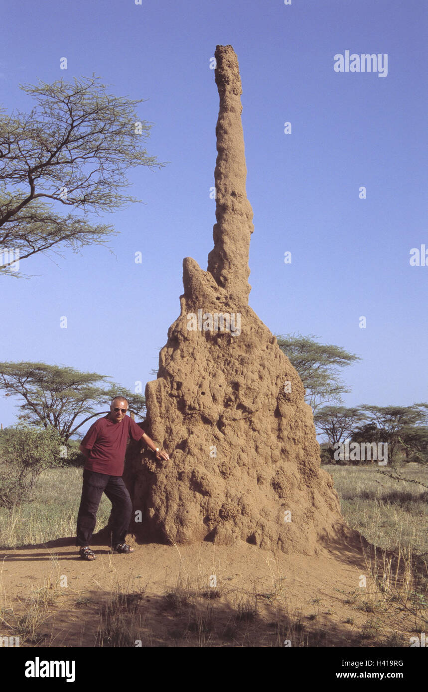 Ethiopia, Omo area, termite construction, man, pose, no model release ...