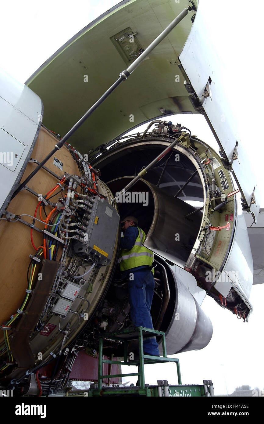 Airport grounds, airplane, detail, engine, worker, maintenance, no ...