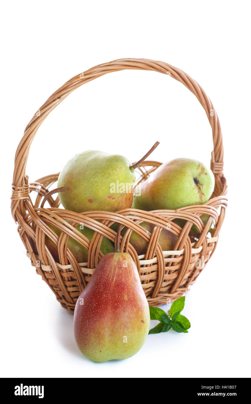 Green pears in basket Cut Out Stock Images & Pictures - Alamy