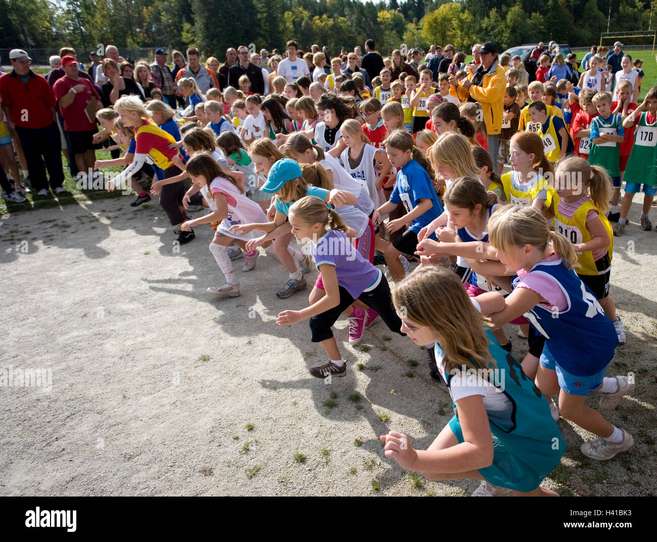 girls at starting line in track race Stock Photo - Alamy