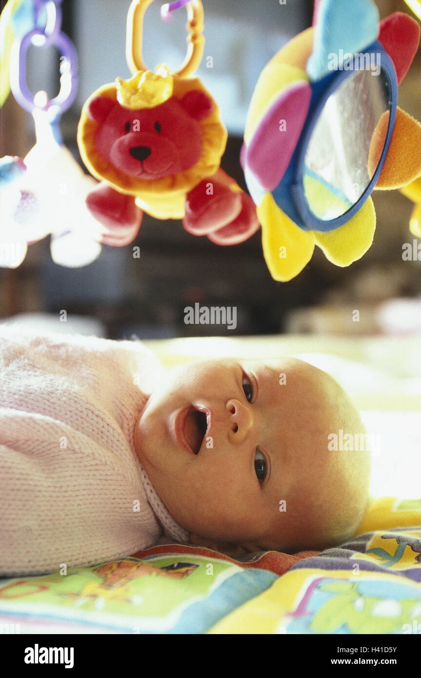 Baby, lie, happy, back position, mobile, very close, inside, at home ...