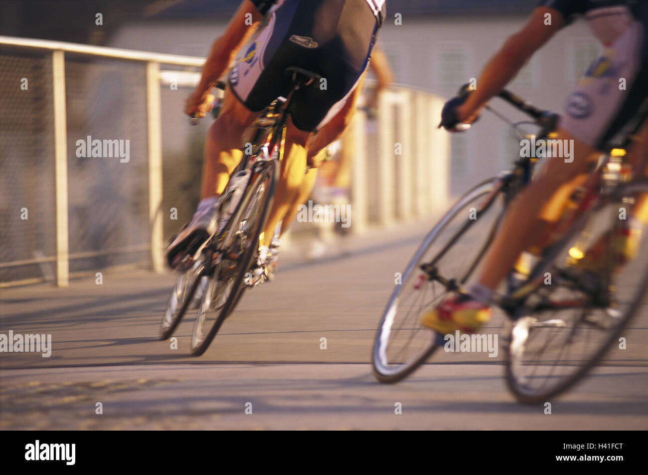 Cycle race, cyclist, bend position, curled, blur, no model release ...