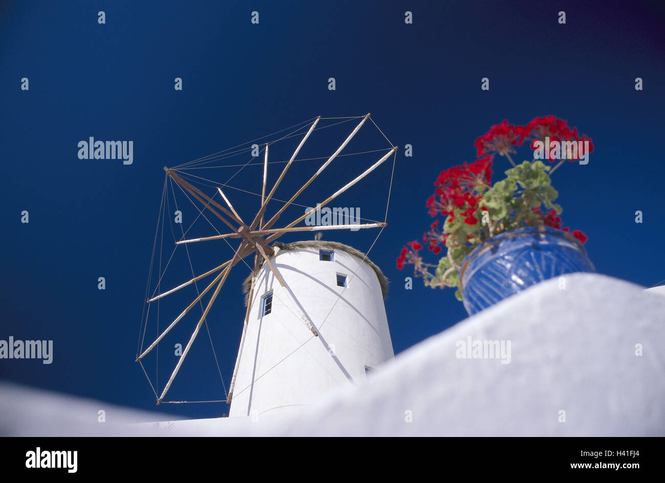 Greece, the Cyclades, island Santorin, Oia, windmill, flowerpot, from ...