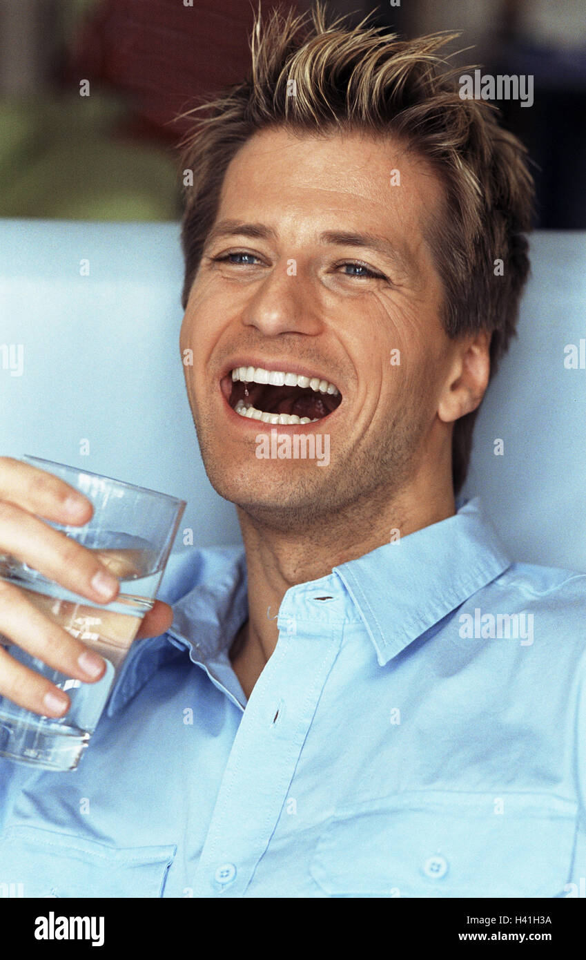 Man, laugh young, water glass, portrait, single, blond, blue eyes, blue ...
