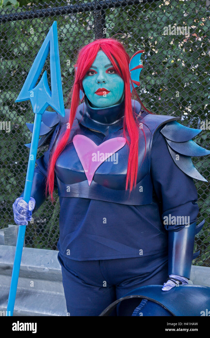 A teenager dresses as Undyne from the video game Undertale at Comicon ...