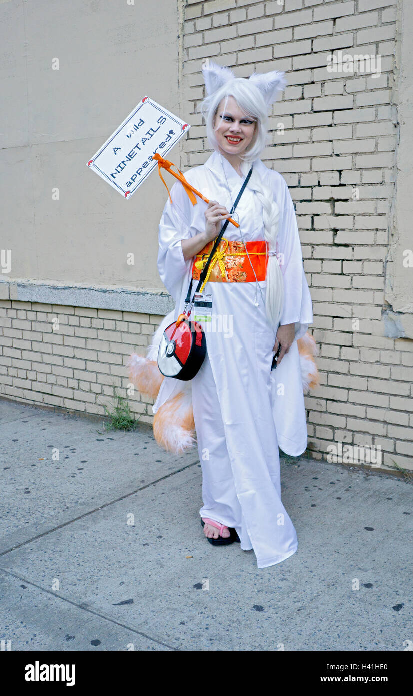 A young lady dressed as Ninetails from Pokemon Go at Comicon 2016 in ...