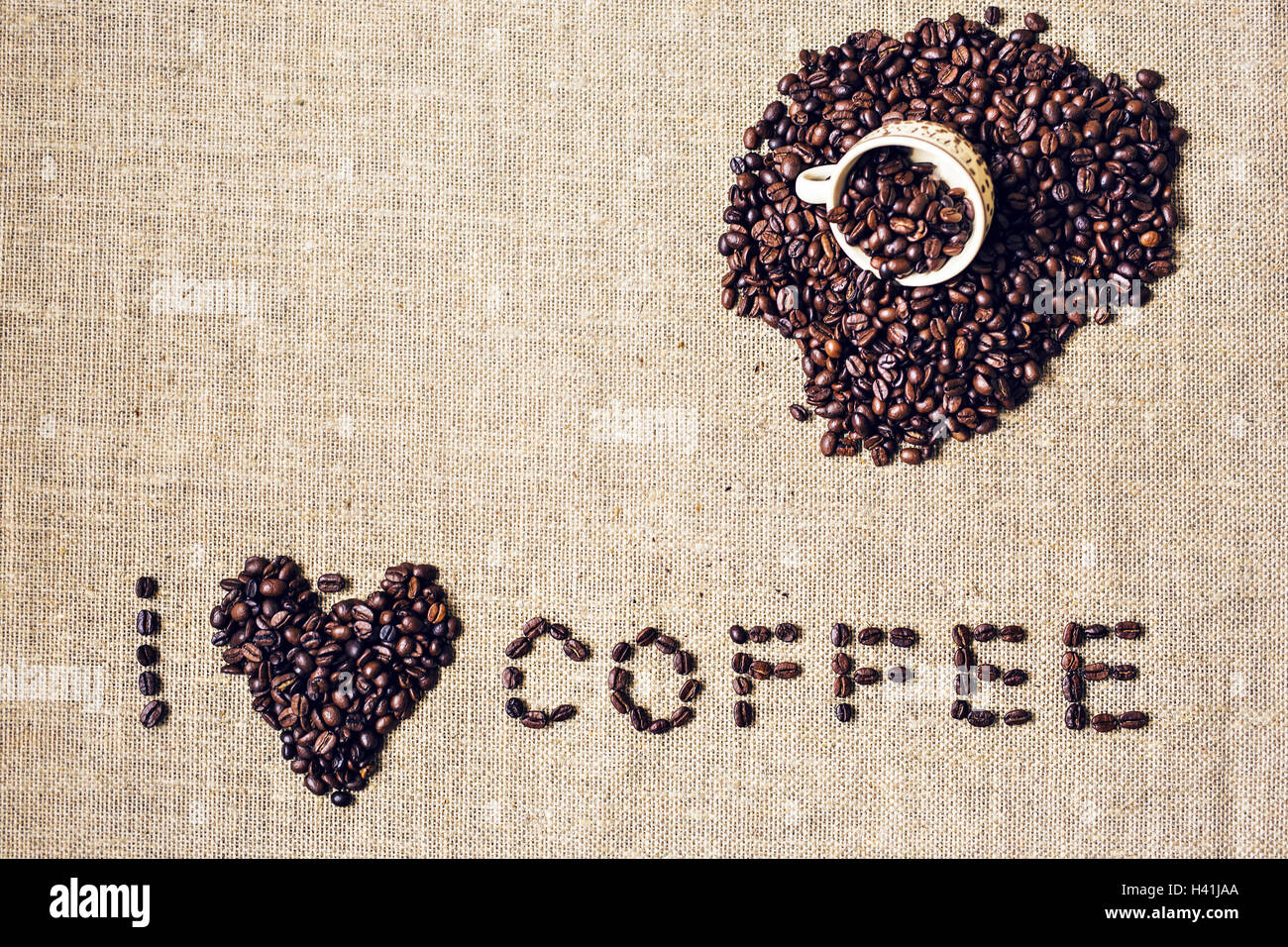 Inscription made from coffee beans says I love coffee. empty copy space ...