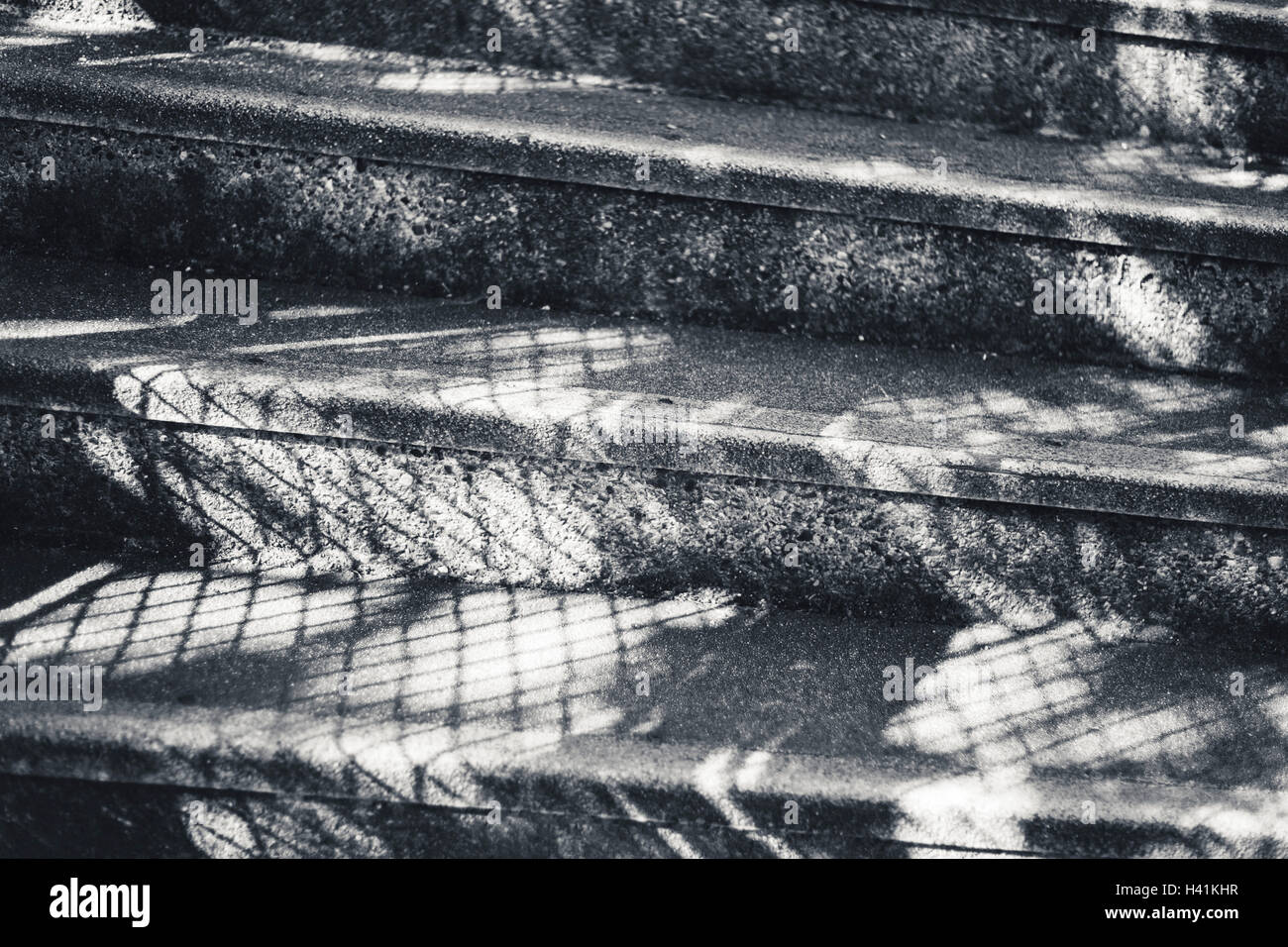 Detail of shadows on stairs leading up to a footbridge Stock Photo - Alamy