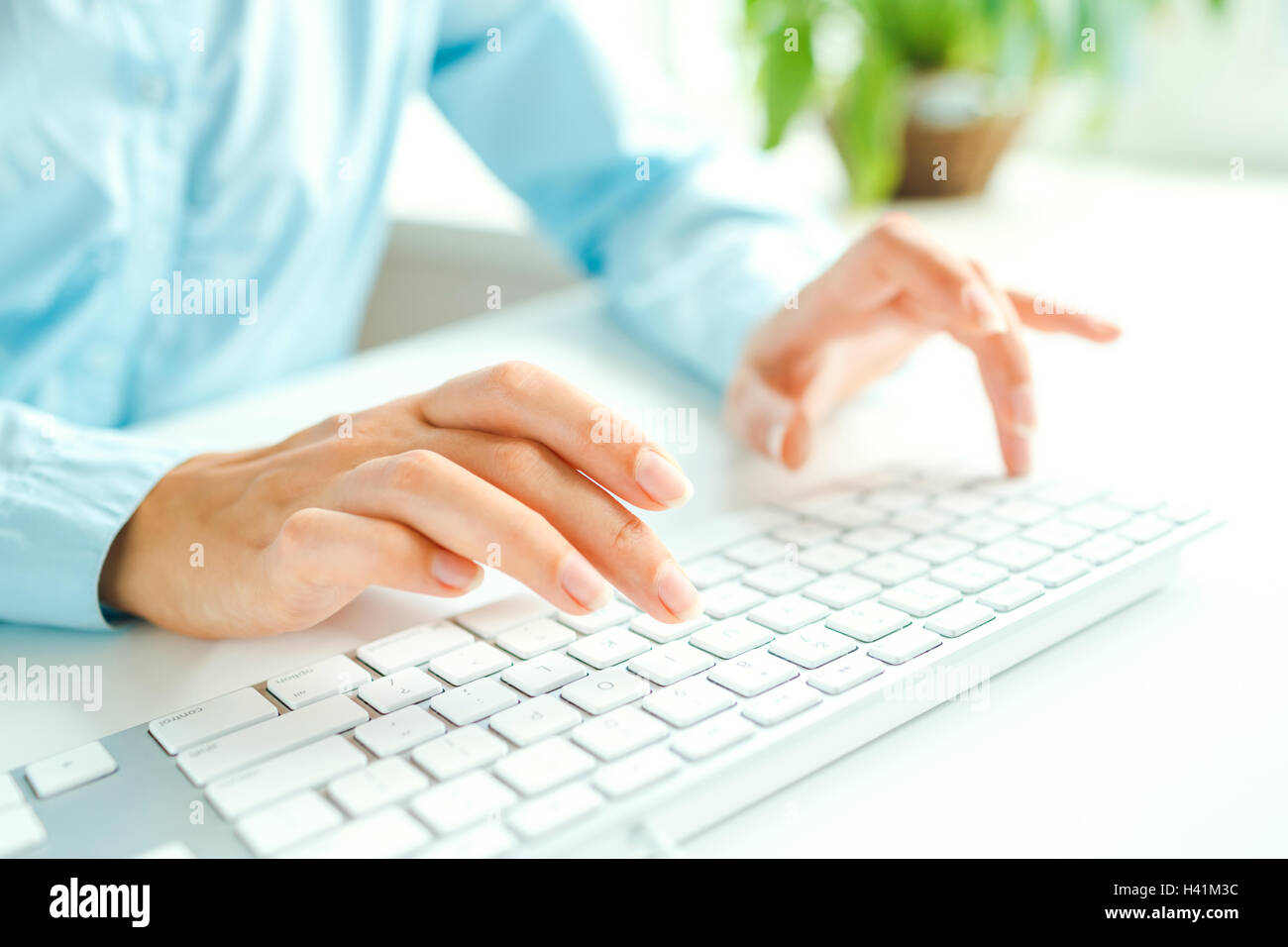 Female hands or woman office worker typing on the keyboard Stock Photo ...