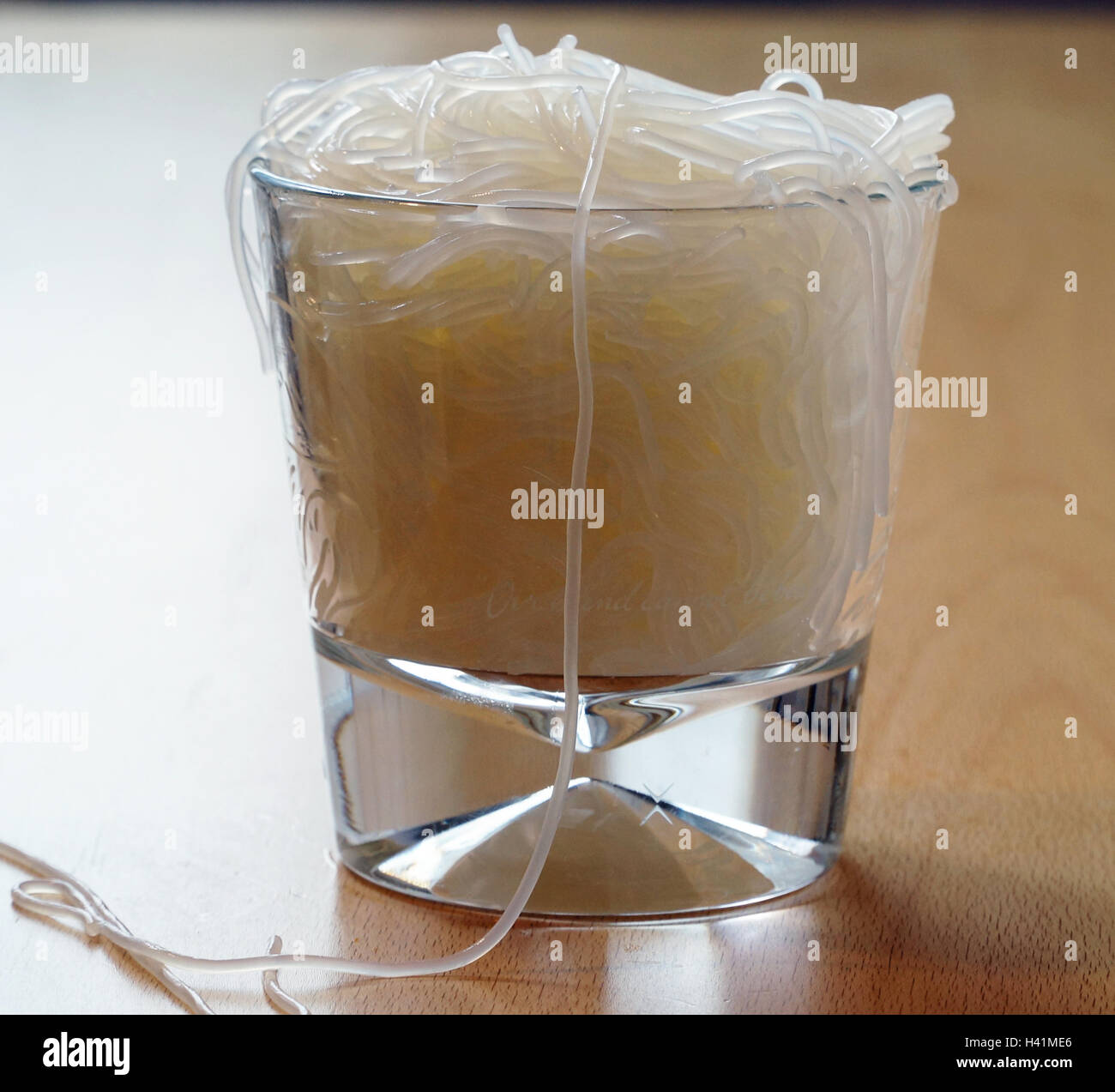 Rice noodles in a transparent glass Stock Photo - Alamy
