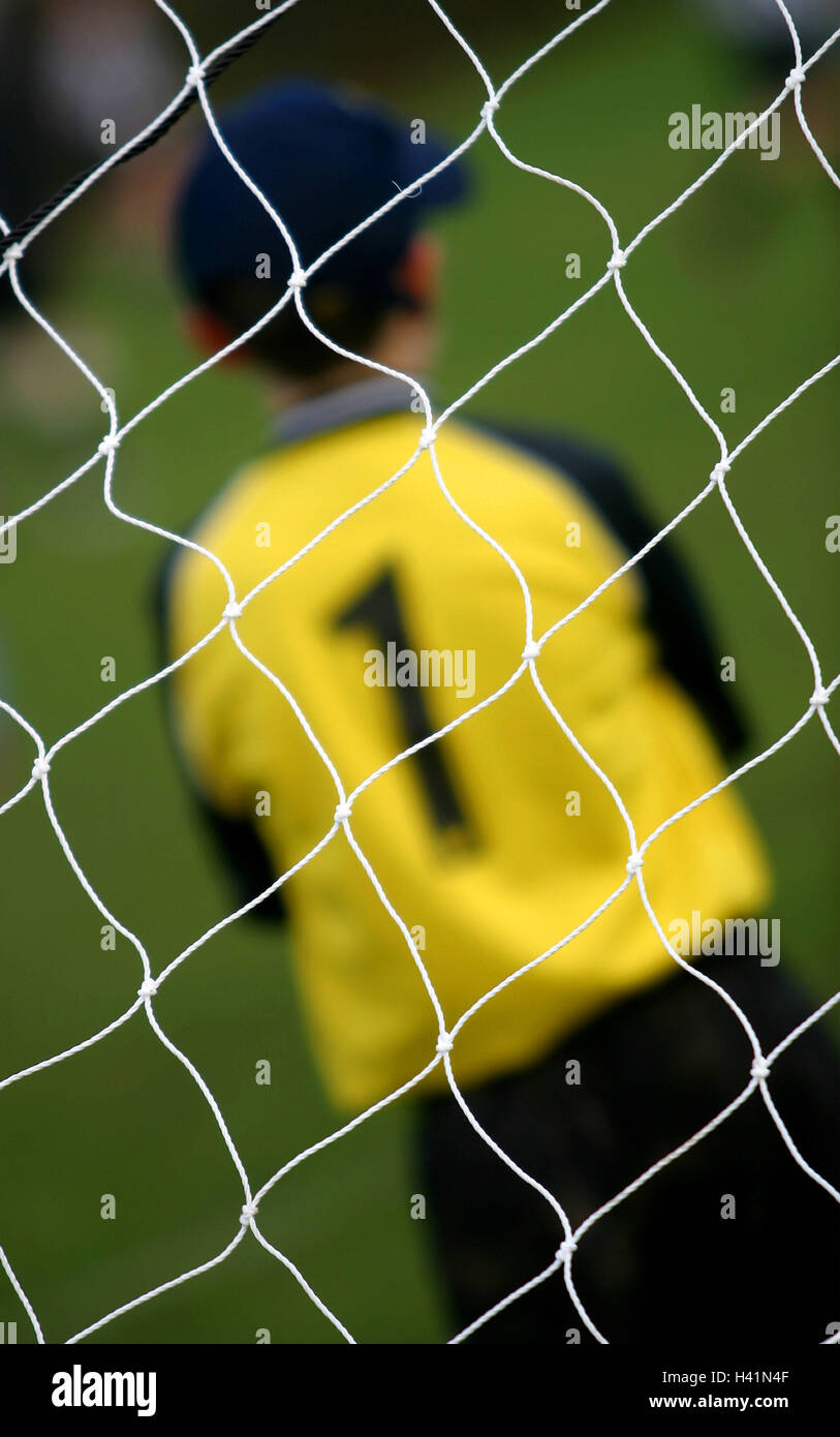 Football match, boy, goal, back view, no model release! Child ...
