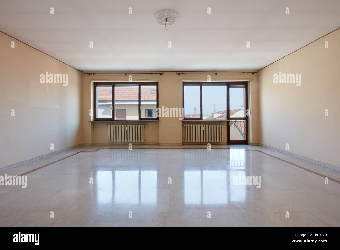 Empty living room with marble floor Stock Photo - Alamy
