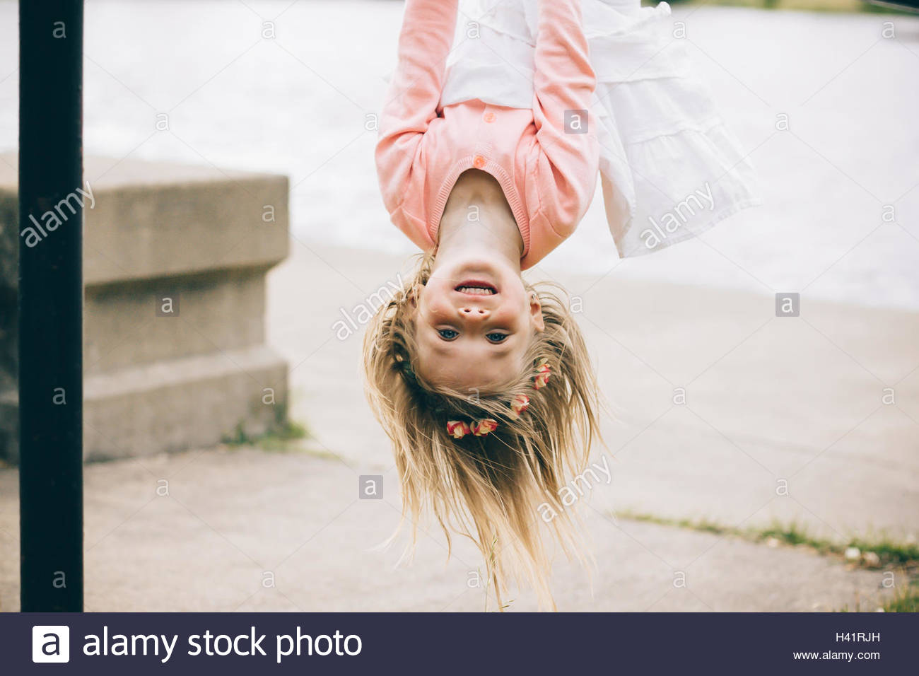 Girls Hanging Upside Down High Resolution Stock Photography and Images - Alamy