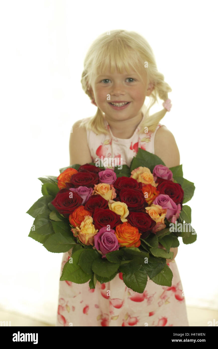 Child with roses hi-res stock photography and images - Alamy
