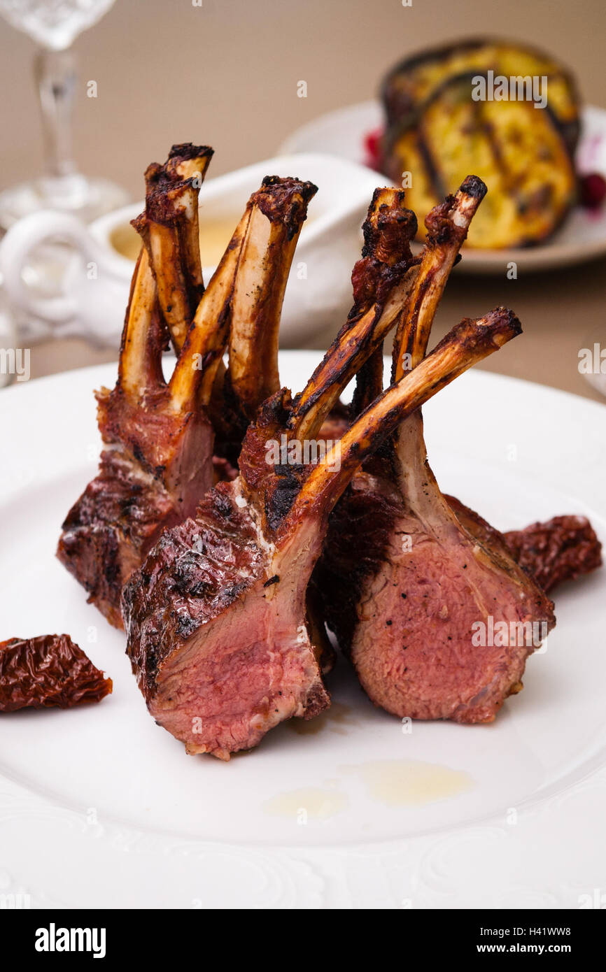 Lamb rack on a plate Stock Photo - Alamy