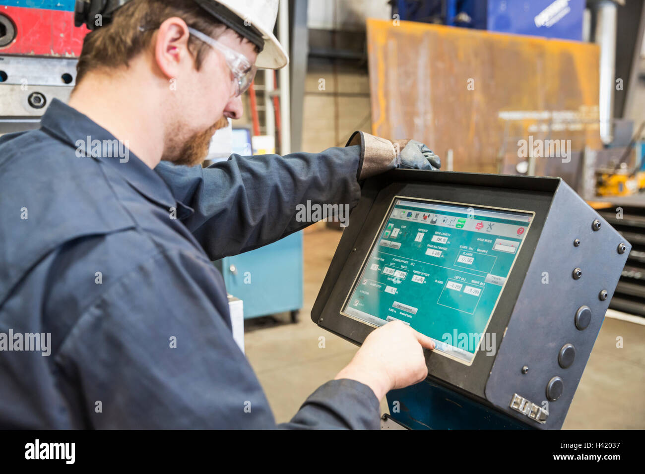 Side view worker using hi-res stock photography and images - Alamy