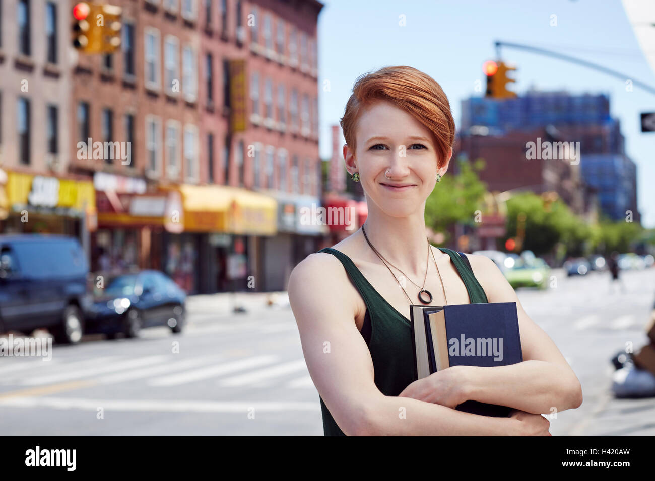 Carrying books hi-res stock photography and images - Alamy