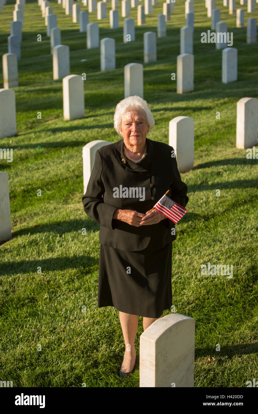 Military widow holding american flag hi-res stock photography and ...