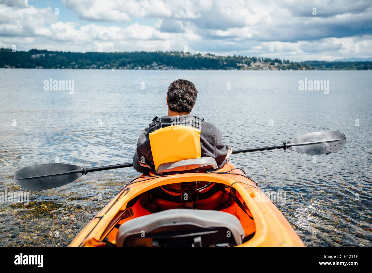 Man sitting in kayak in hi-res stock photography and images - Alamy