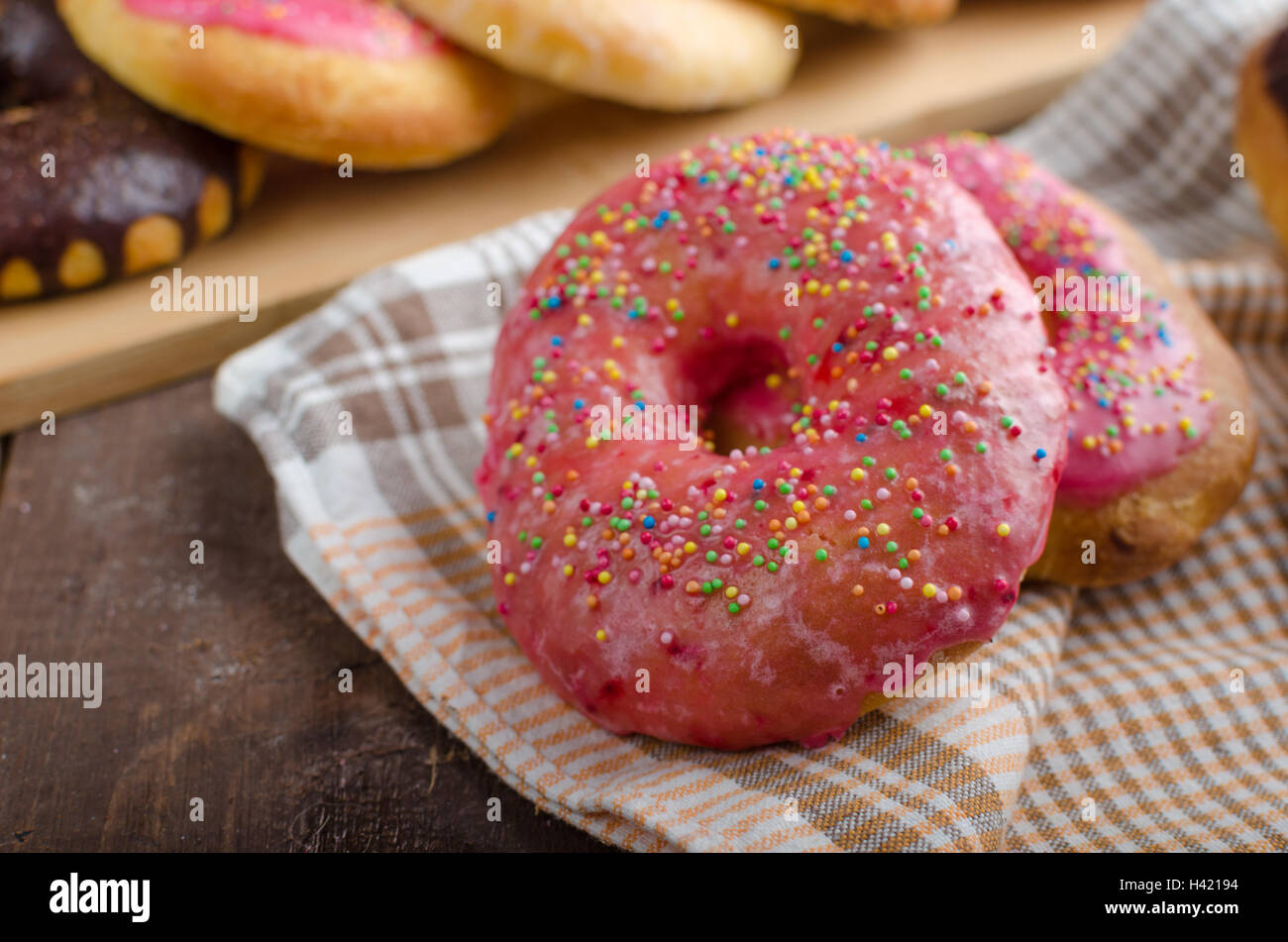 Homemade donuts, big one for bigger hunger, chocolate pinky and suger ...