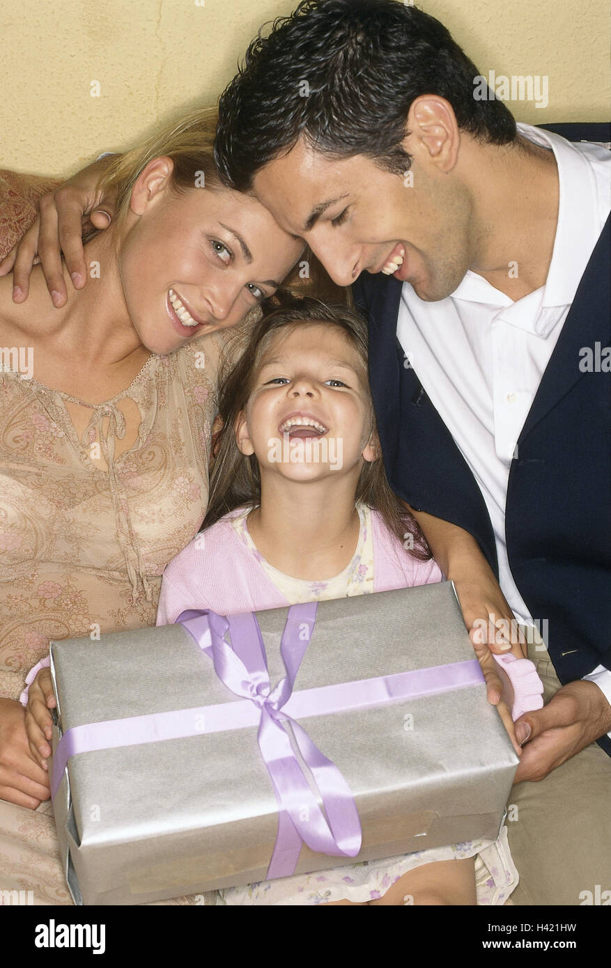 Parents, subsidiary, present, happy, portrait, model released, family ...