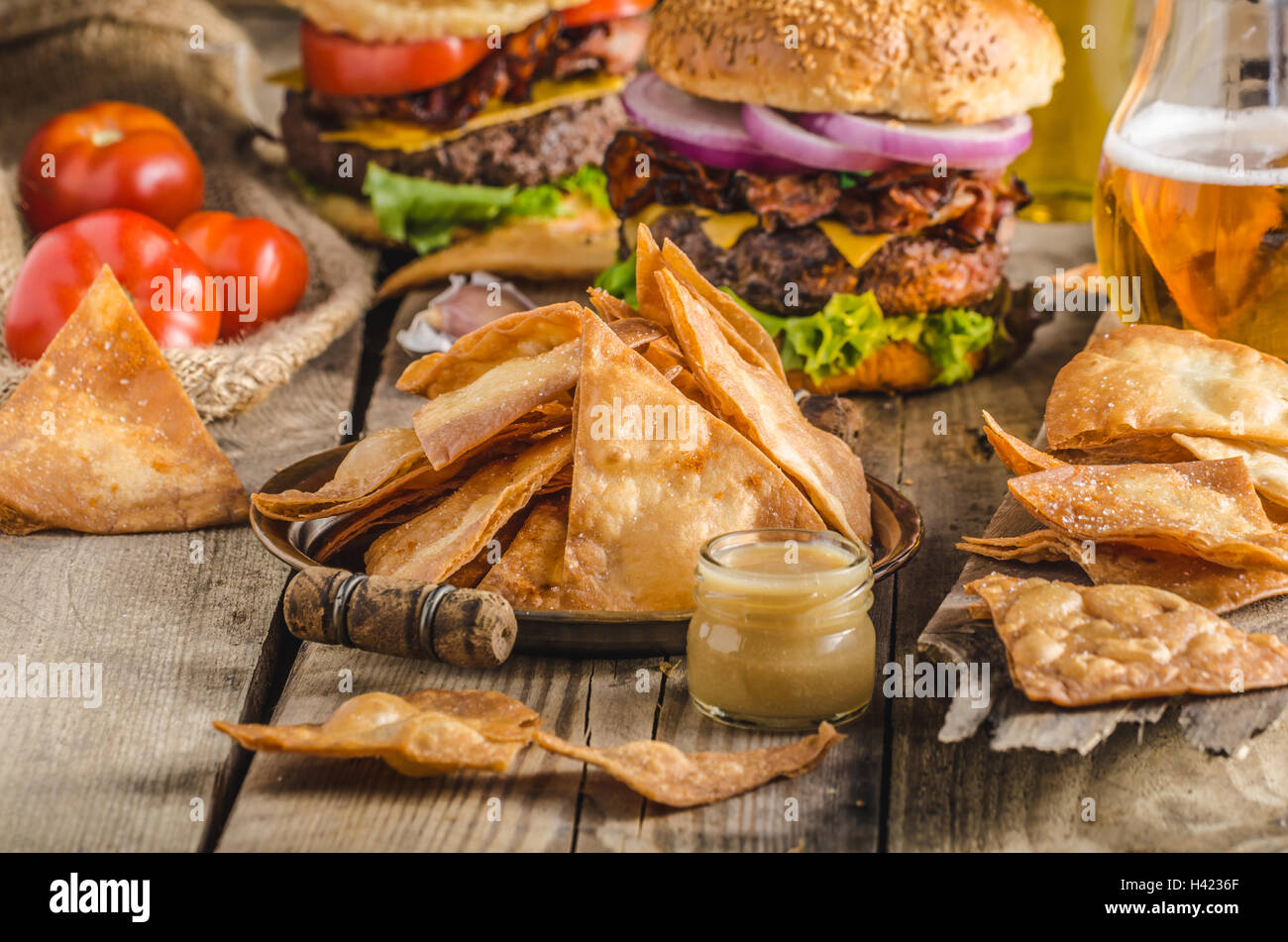 American rustic bacon burger with cheddar, beef, salad and vegetable ...