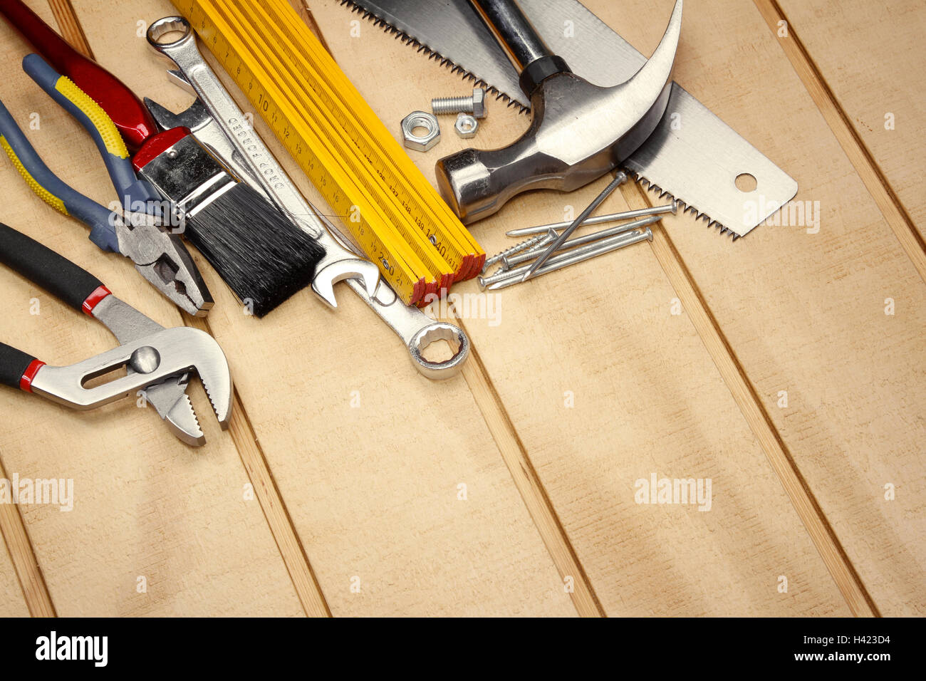 Assorted work tools on wood Stock Photo - Alamy