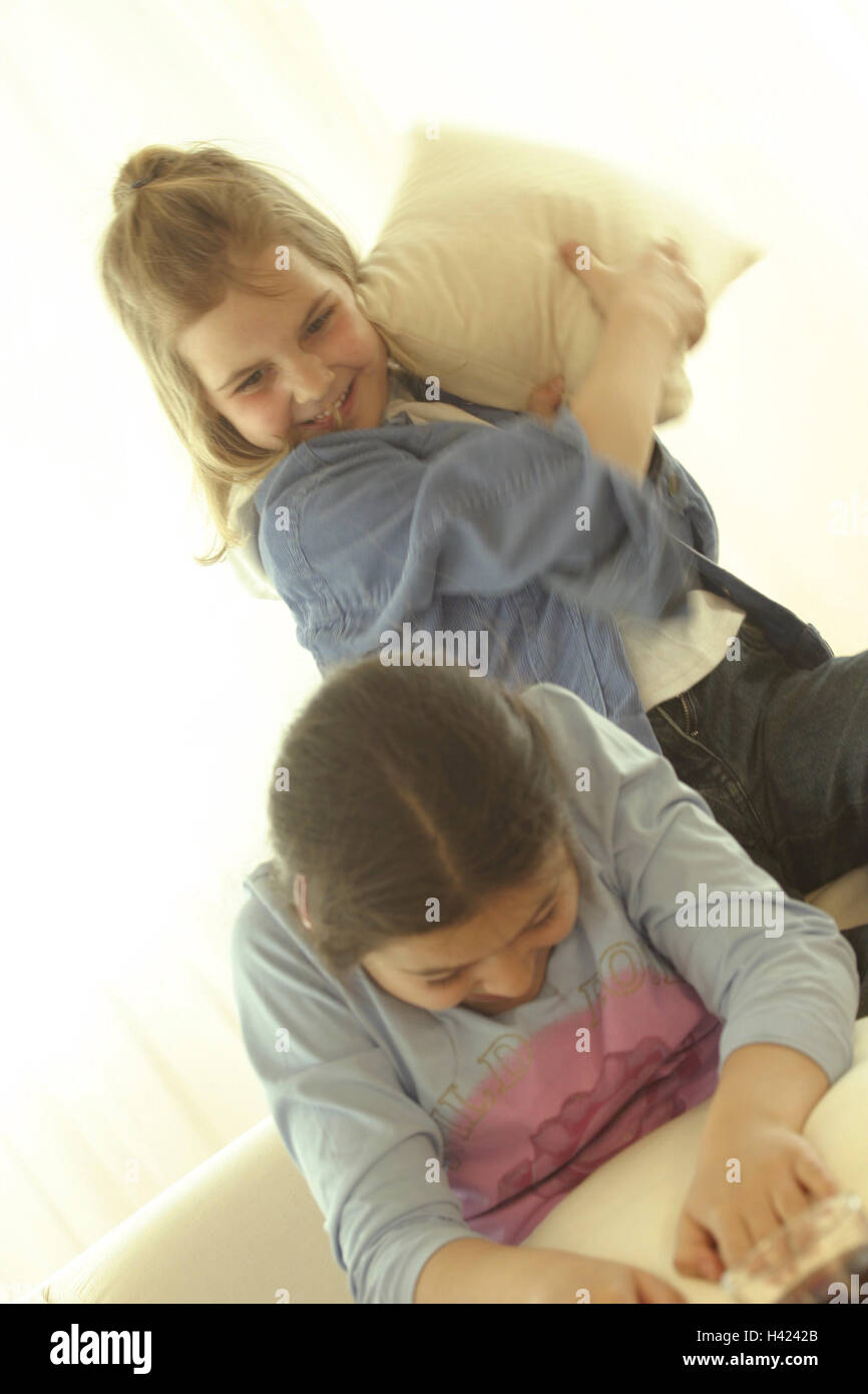 Sofa, girl, two, cushion battle, 5-8 years, children, siblings, friends ...