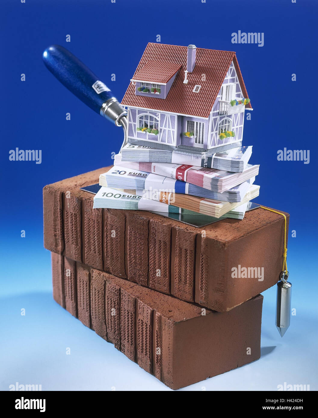 Icon, building of a house, financing, bank notes, euro, bundled up, red ...