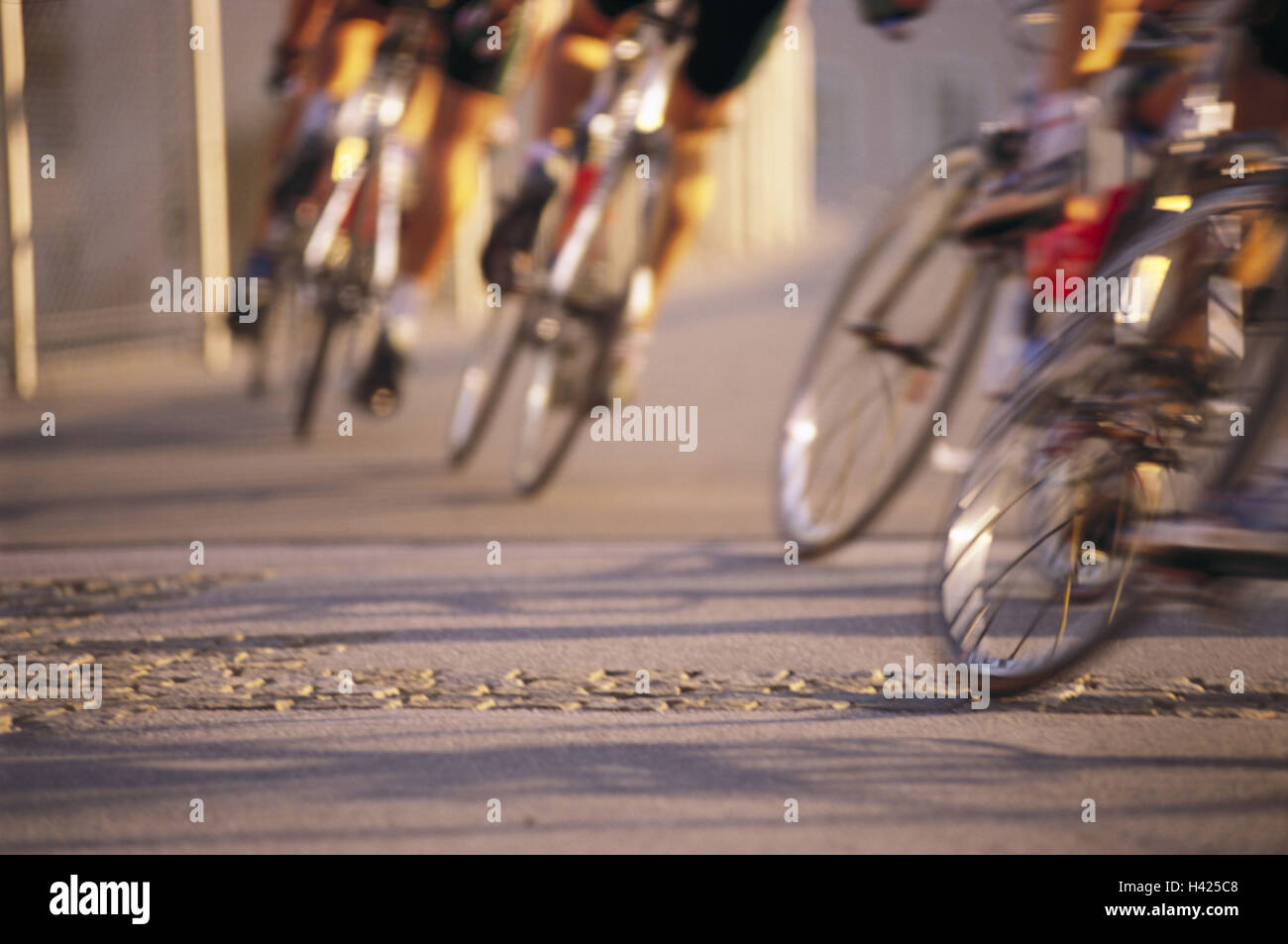 Cycle race, cyclist, bend position, curled, blur, no model release ...