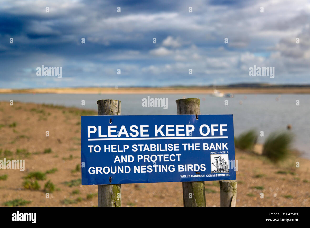Sign indicating protected area for nesting birds Wells Beach and dunes ...