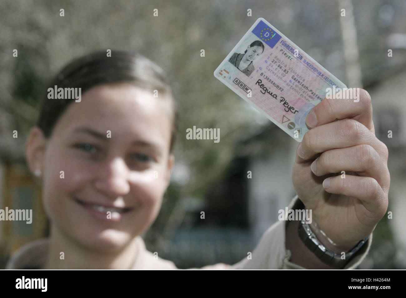 Woman, young, driving licence, point, smile, portrait, 20-30 years ...