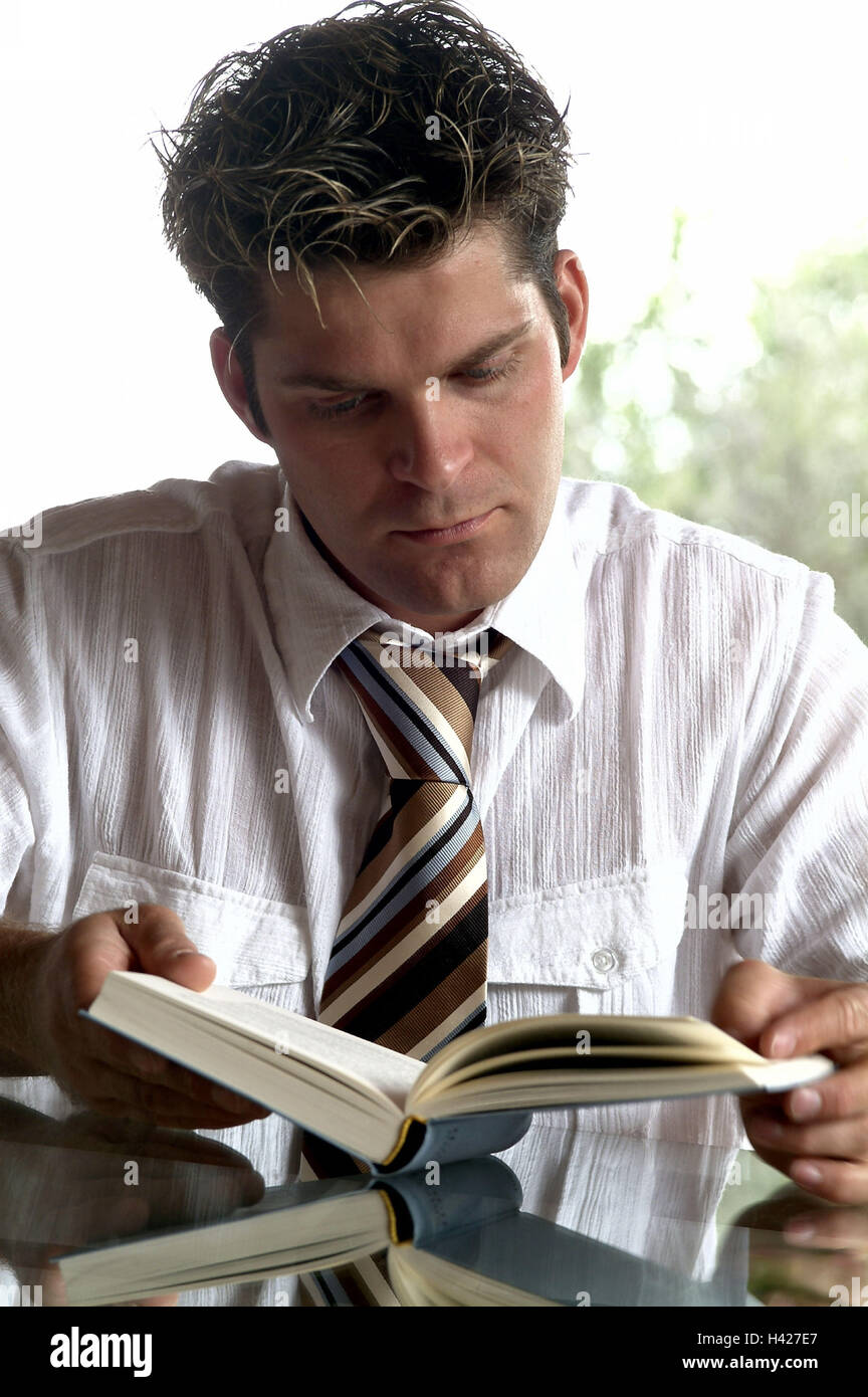 Man, young, glass table, sitting, book reading, reading, formation ...