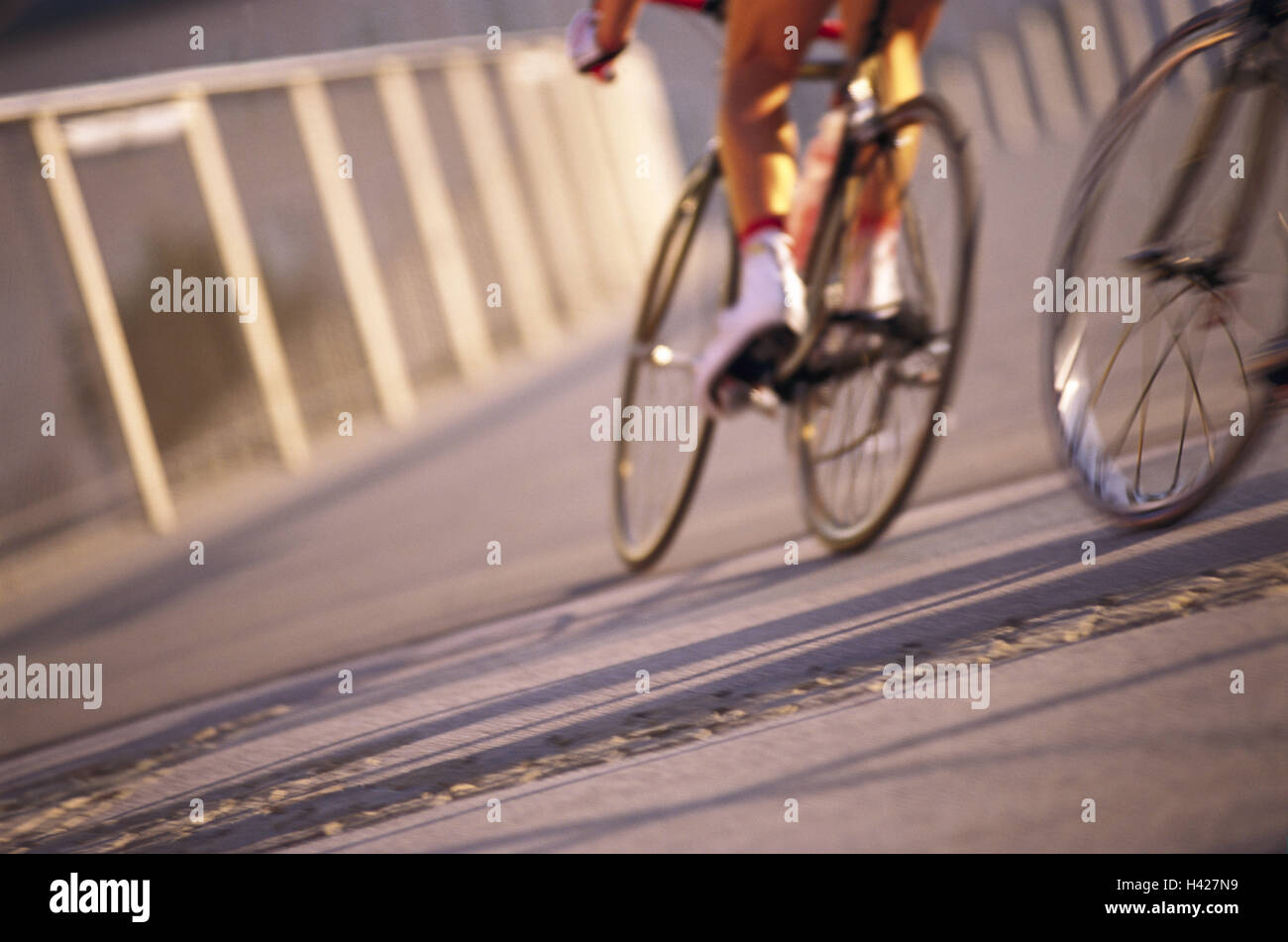 Cycle race, cyclist, bend position, curled, blur, no model release ...