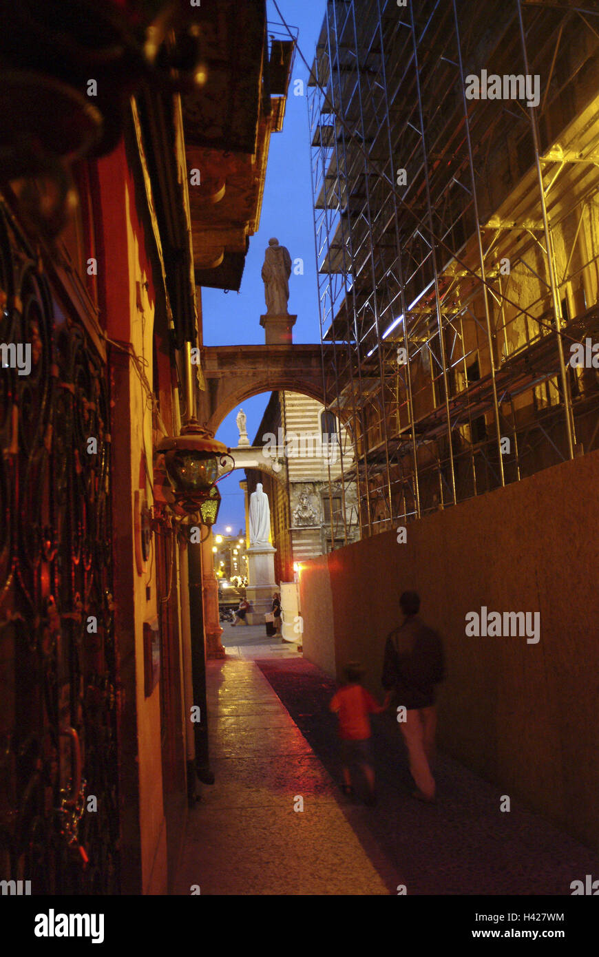 Italy, Veneto, Verona, lane, statues, father, child, walk, back view ...
