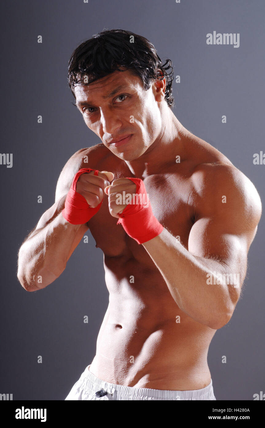 Man, muscular, upper bodies free, Hands, bandages, fight pose, Half ...