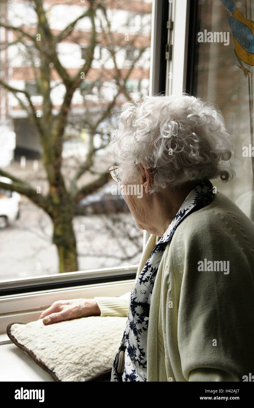 Old woman window dementia hi-res stock photography and images - Alamy