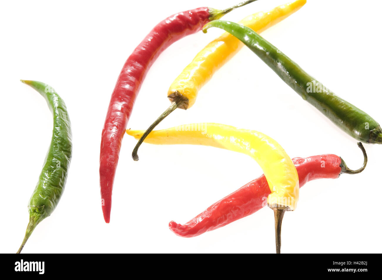 Peperonis, different colour, cut out Stock Photo - Alamy
