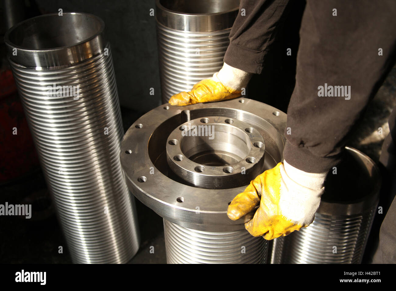 Cylinder and Workman Stock Photo - Alamy