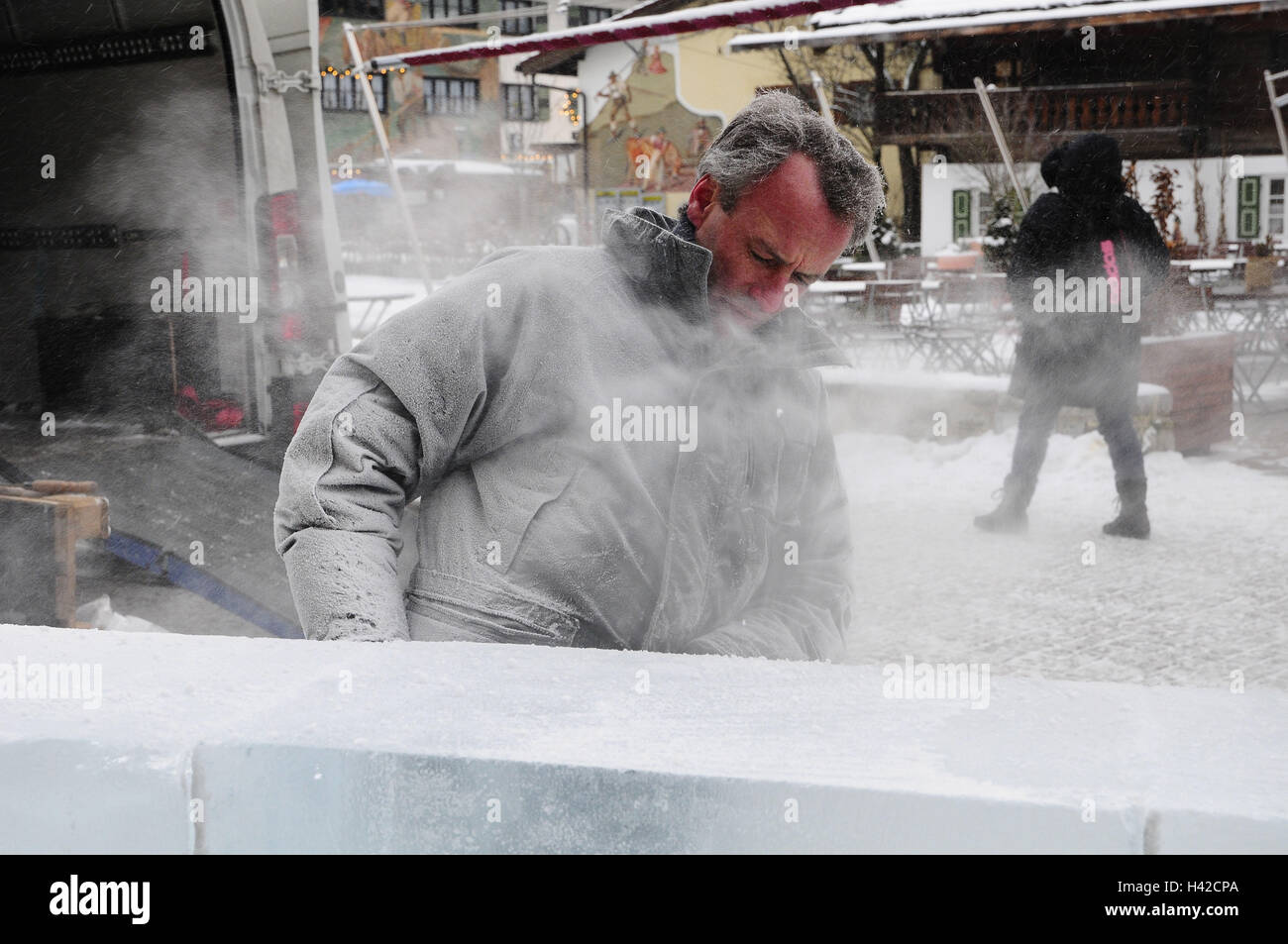 Man, ice cream sculpture, ice cream dust, trail Stock Photo - Alamy