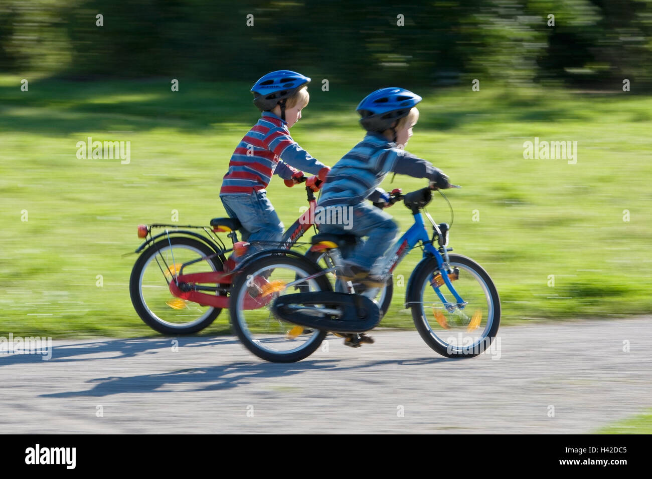 Boys, helmets, bicycle driving, side view, blur, person, children, two ...