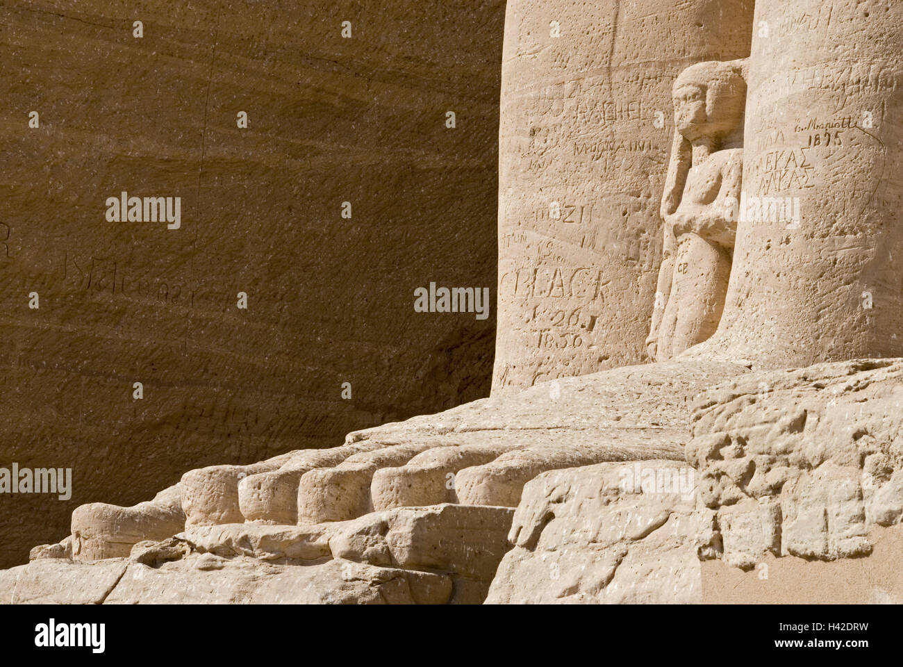 Egypt, Abu Simbel, temple attachment Ramses II., giant statue, detail ...