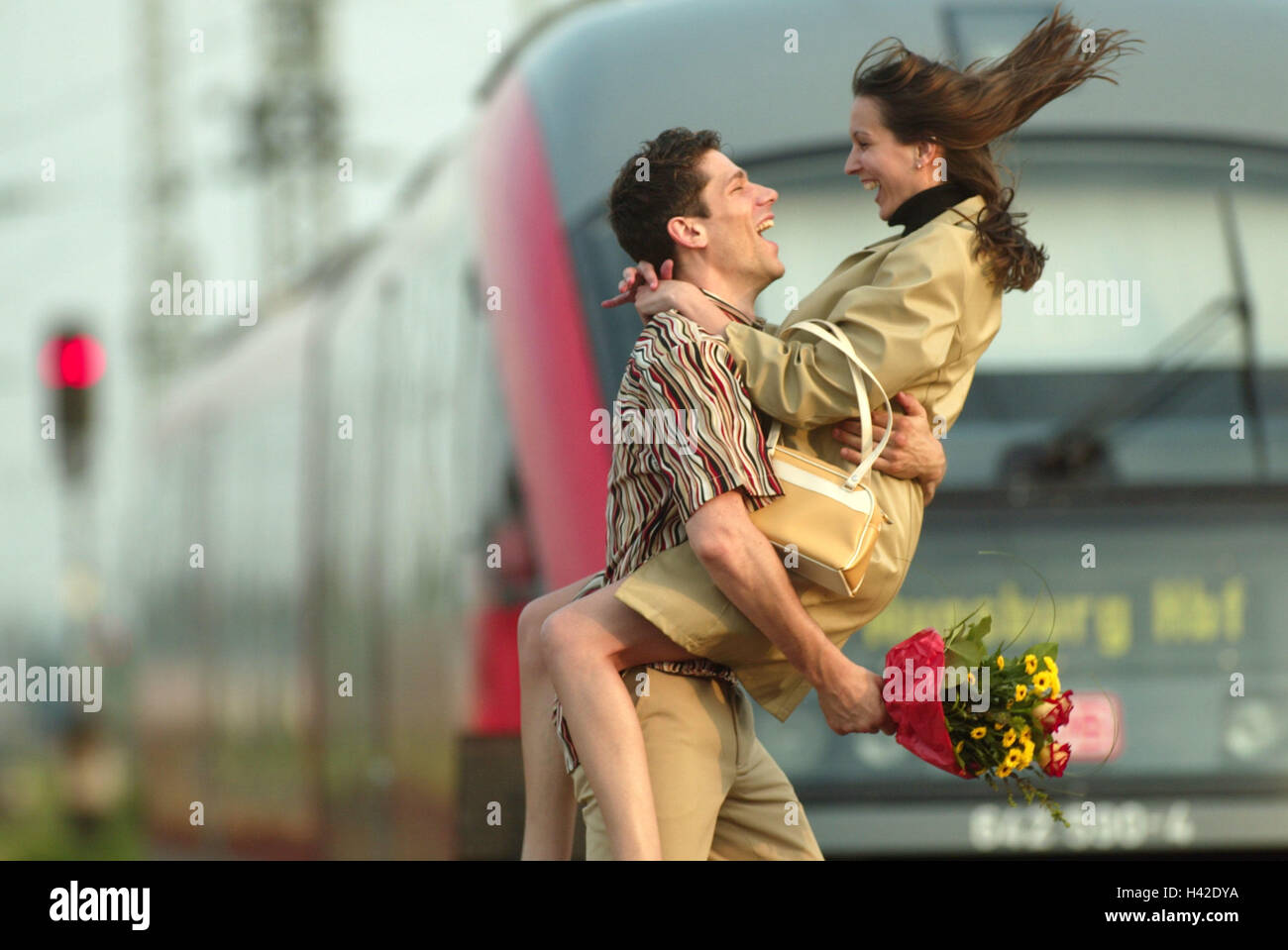 Platform, couple, greeting, embrace, bouquet, joy, melted railway ...